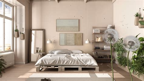 푹신하고 바람이 잘 통하는 민들레가 Diy 팔레트 침대 부드러운 이불이 있는 시골 소박한 나무 침실 위에 씨앗 포자를 날립니다 인테리어 디자인 아이디어 변화 성장 운동 및