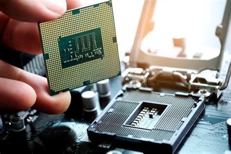 Hand Of Computer Engineering Brings Computer Cpu Processor Memory Change Components Into Socket