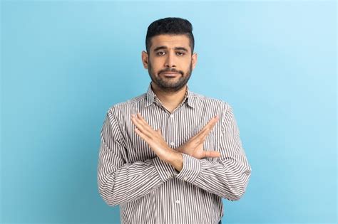Premium Photo Businessman Crossing Hands Showing X Gesture Rejecting