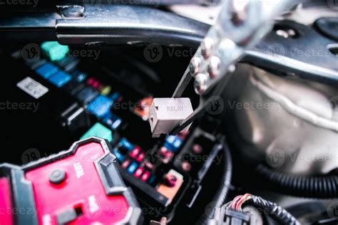 Car Electromagnetic Relay Switch Removed With Relay Removal Pliers For