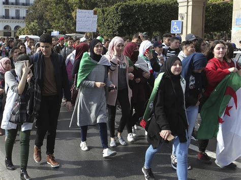 Algerias Leader Returns Home As Demonstrators Protest His Bid For A