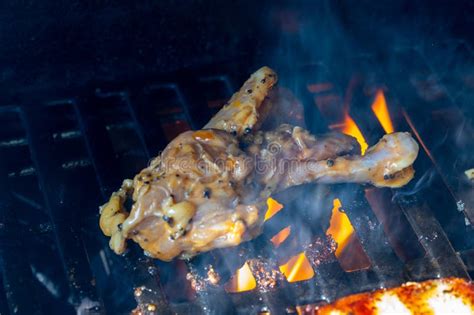Marinated Pork Steak And Chicken Steak On The Grill Grate With Flames