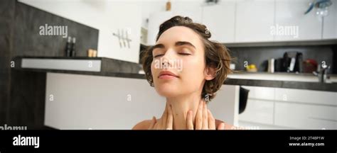 Close Up Portrait Of Sportswoman Fitness Woman Massaging Her Neck