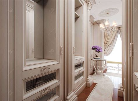 Светлые встроенные шкафы в интерьере гардеробной