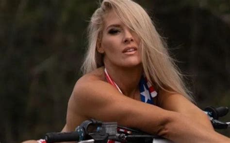 Lacey Evans Straddles A Motorcycle In Skimpy American Flag Swimsuit