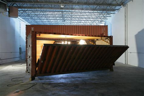 Illy Shipping Container Push Button House