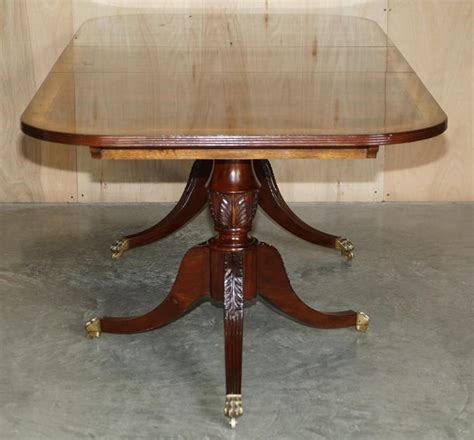 Flamed Hardwood And Walnut Based Tripod Extending Dining Table Brass