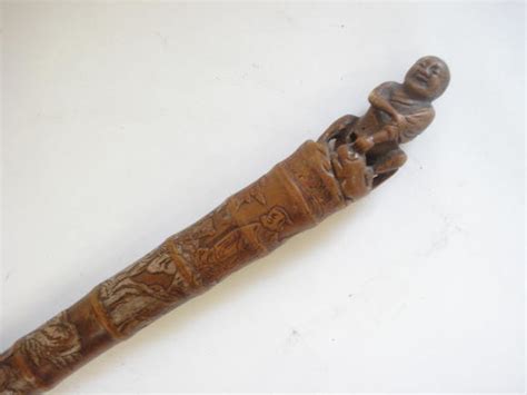 Bonhams A Carved Bamboo Walking Cane 19th Century