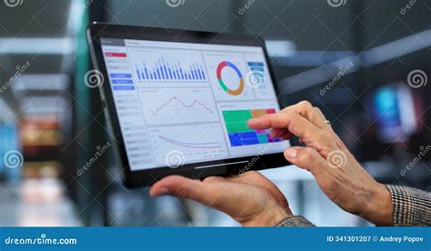 Data Analyst Working On Business Analytics Dashboard With Charts