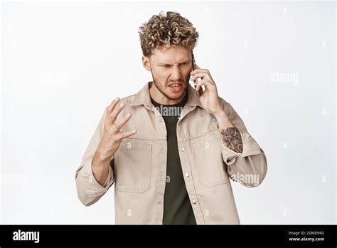 Frustrated Man Shouting And Arguing Over Phone Call Pissed Off During