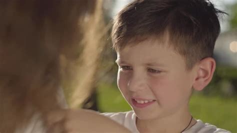 Portrait Of Older Sister Spending Time With Younger Brother Outdoors Stock Footage