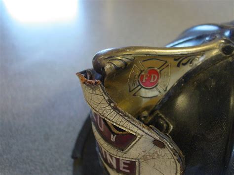 Cairns And Brothers Fire Helmet Engine 2 Lieutenant Lfd Badge Burnt