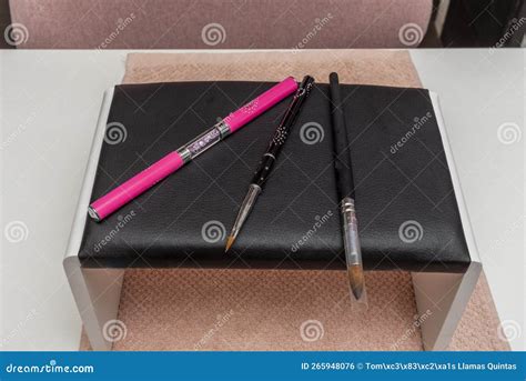 Different Brushes And Utensils For Grooming Nails In A Beauty Salon