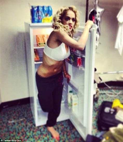Rita Ora Flashes Her Washboard Abs In A Skimpy Bralet As She Continues