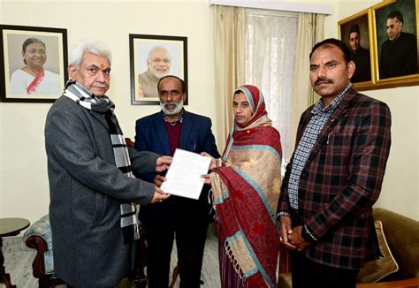 Lg Sinha Hands Over Appointment Letter To Wife Of Martyr Hav Abdul