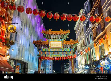 Red Chinese Lanterns And Gate In Gerrard Street Chinatown At Night In