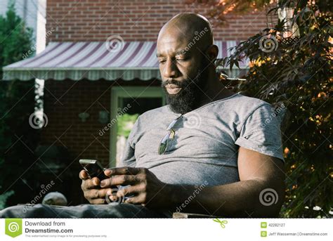 Man Reading Text Message In Garden Stock Image Image Of Black Email 42282127