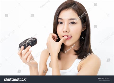 Asian Girl Sucking Her Finger Isolated Over 11 Royalty Free Licensable