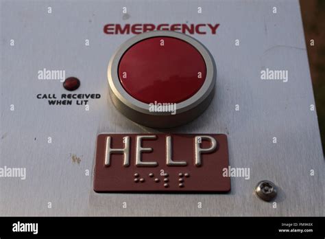 A Red Help Button With A Call Received When Lit Indicator To The Left Stock Photo Alamy