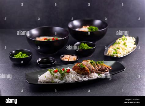 Various Dishes Of Asian Cuisine With Different Types Noodles And Rice