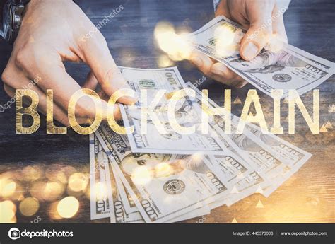 Multi Exposure Of Blockchain Theme Drawing Hologram And Usa Dollars Bills And Man Hands