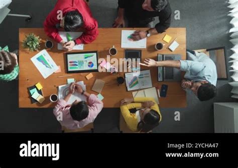 Top View Of Businesswoman Sharing Idea While Stand At White Board While Manager Asking Question