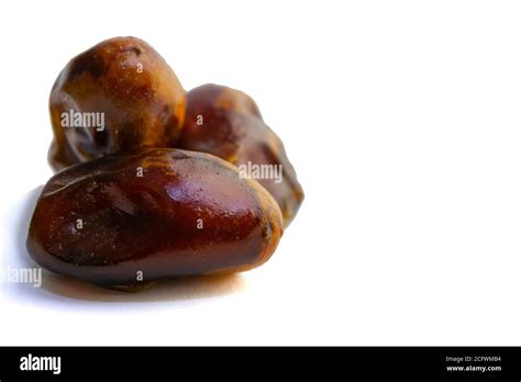 Three Sweet Dry Dates Isolated On A White Background Copy Paste Stock