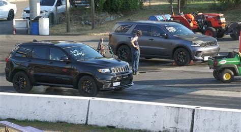Dodge Durango Srt Hellcat Races Jeep Grand Cherokee Trackhawk Winner