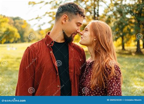 Chill Young Couple In Love With Each Other Are Touching Noses And