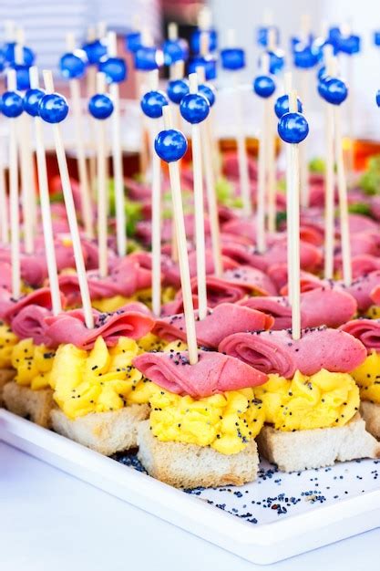 Premium Photo Small Canapes With Bread