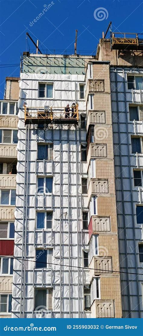 Workers Are Preparing A Wall For Cladding The Facade Editorial