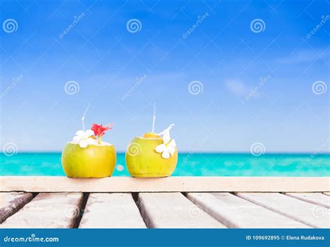Two Fresh Coconut Cocktails On Tropical Beach Stock Image Image Of