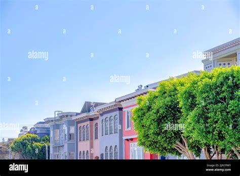 Colorful Adjacent Residential Buildings With Paned Windows At San