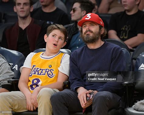 Casey Affleck And Son Indiana Affleck Attend A Basketball Game News