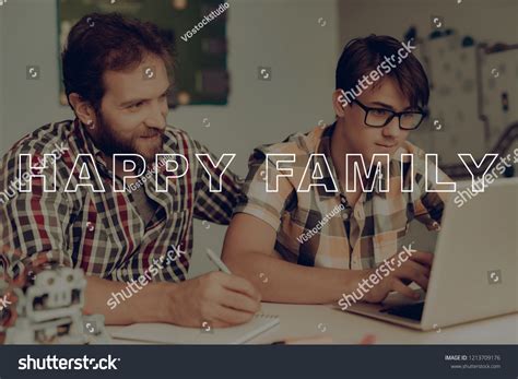 Father Son Programming Robot On Laptop Stock Photo Shutterstock