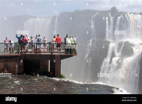 Visitors Cross Along The Walkway To The Viewing Platform Getting A
