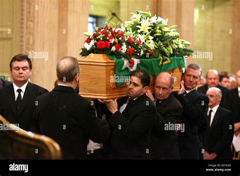 George Bests Coffin Is Carried Into The Parliament Buildings In