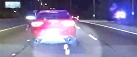 Moment Cops Launch Gps Tracking Dart To Catch Criminal During Car Chase As New Device Flies Out