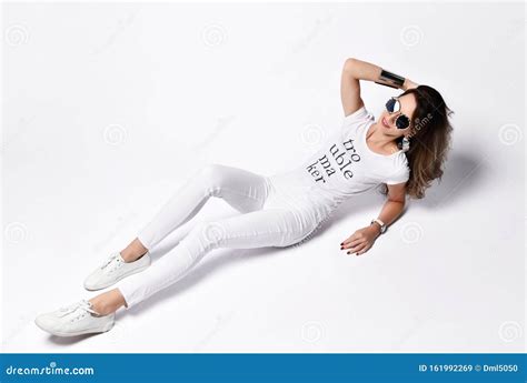 View From Above Slim Tall Woman In White T Shirt Tight Jeans And