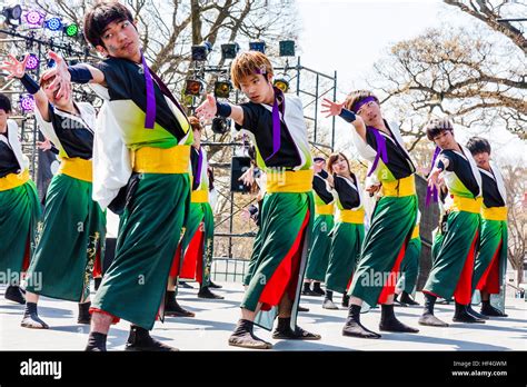 Japanese Yosakoi Dance Festival Men And Women Team Dancing On Stage In