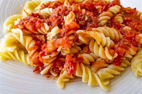 Premium Photo Ready To Eat Pasta With Tomato Sauce