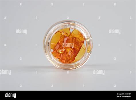 Orange Golden Extract Dab Cannabis In Bottle Stock Photo Alamy