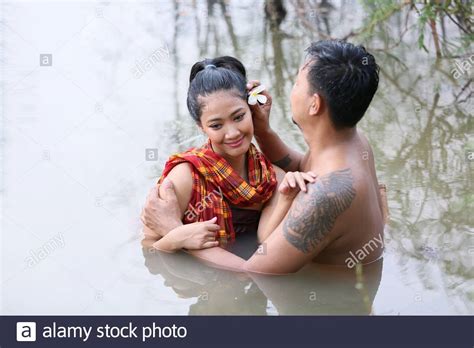 People Person Couple Man Woman Bathing In River Hi Res Stock