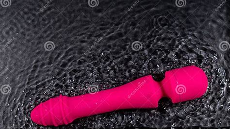 The Pink Creates A Vibration On The Surface Of The Water Sex Toy On A