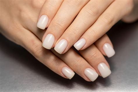 Premium Photo Beautiful Nude Manicure Short Square Nails Nail Design Manicure With Gel