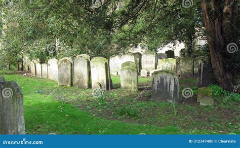 Ancient Gravestones Or Tombstones In A Churchyard Editorial Image