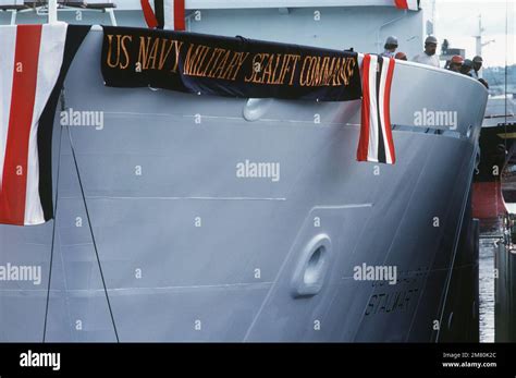 A Military Sealift Command Banner Hangs From The Bow Of The Ocean