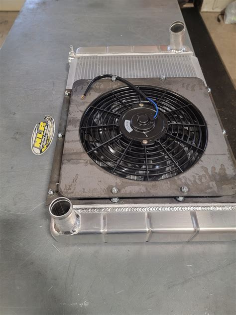 SINGLE 12 INCH FAN AND SHROUD COMBO FOR W BODY RADIATOR NLR Derby Parts