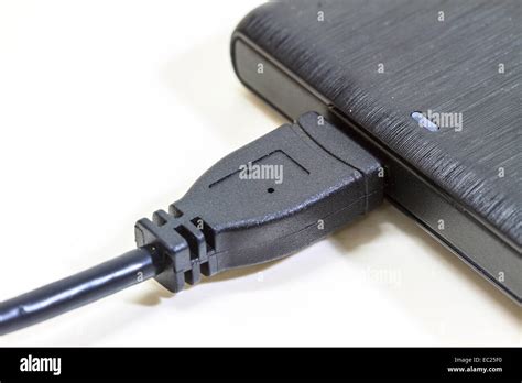 External Hard Drive With Usb Cable On White Stock Photo Alamy