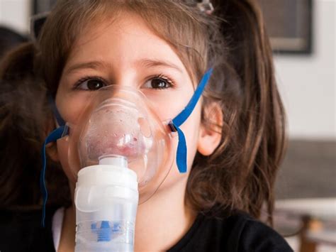Premium Photo Cute Girl Wearing Oxygen Mask In Clinic